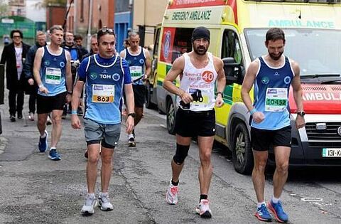 Gardaí switch to blue running vests to flank Colin Farrell in the ...